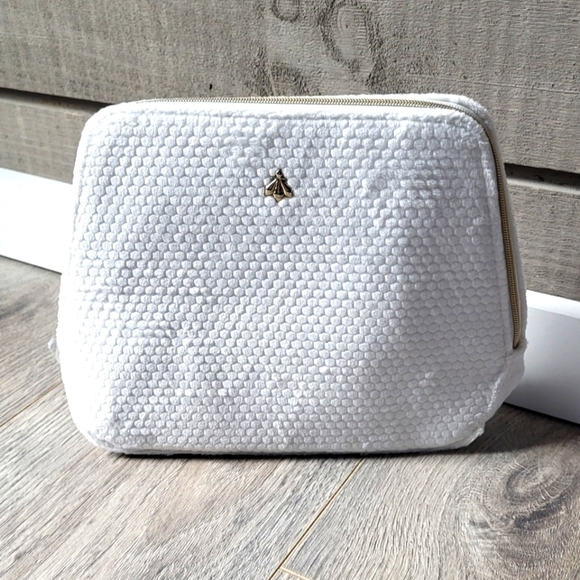 GUERLAIN | Bags | Guerlain White Textured Makeup Travel Pouch | Poshmark